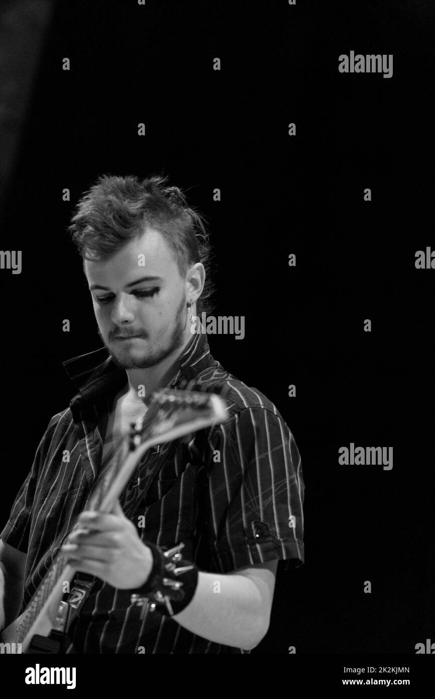 Electric guitarist playing Black and White Stock Photos & Images - Alamy