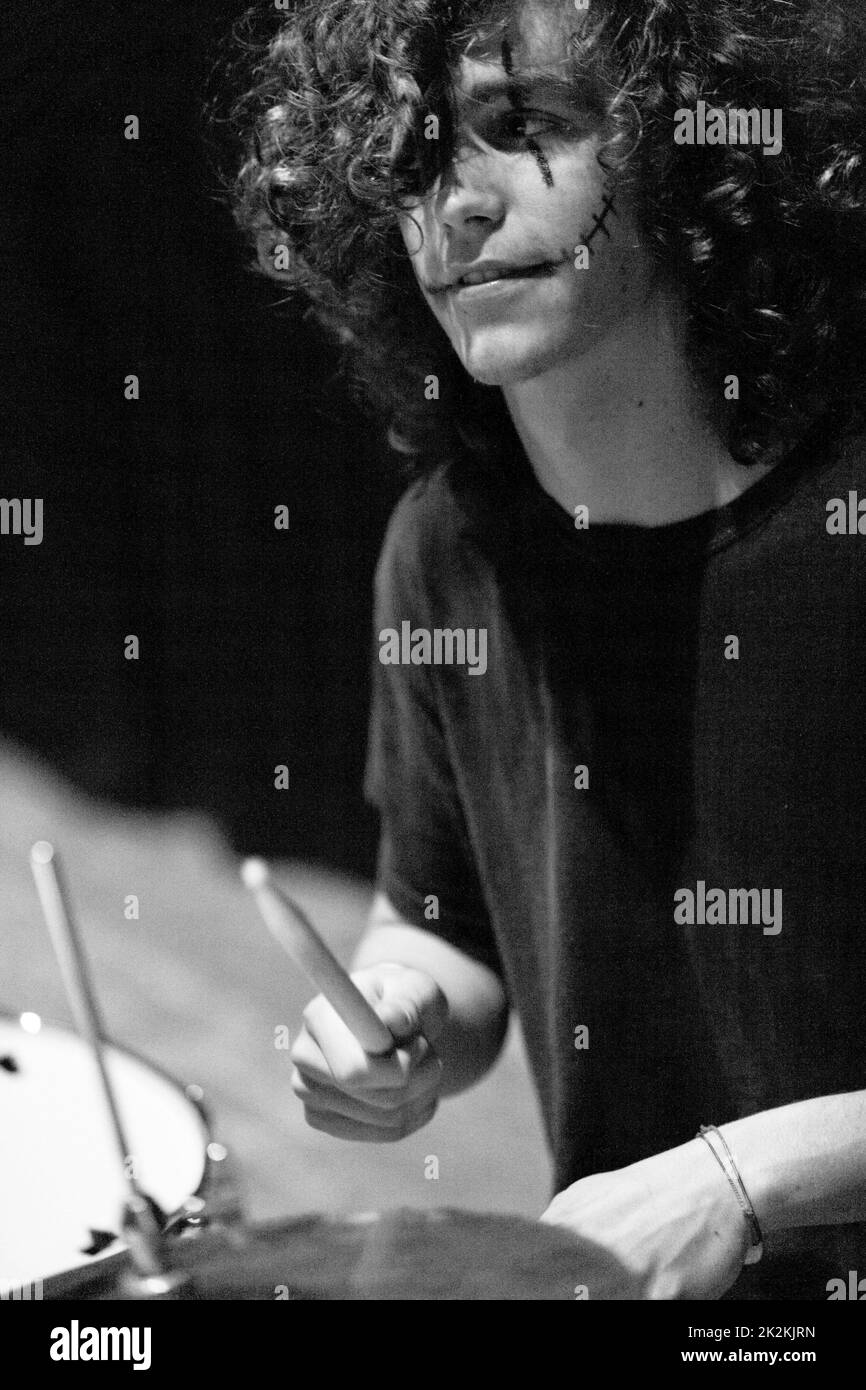 Young drummer boy live on stage Stock Photo - Alamy