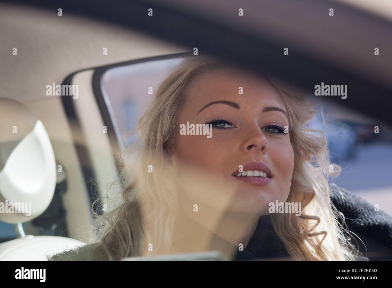 intense look of a beautiful blonde woman Stock Photo - Alamy
