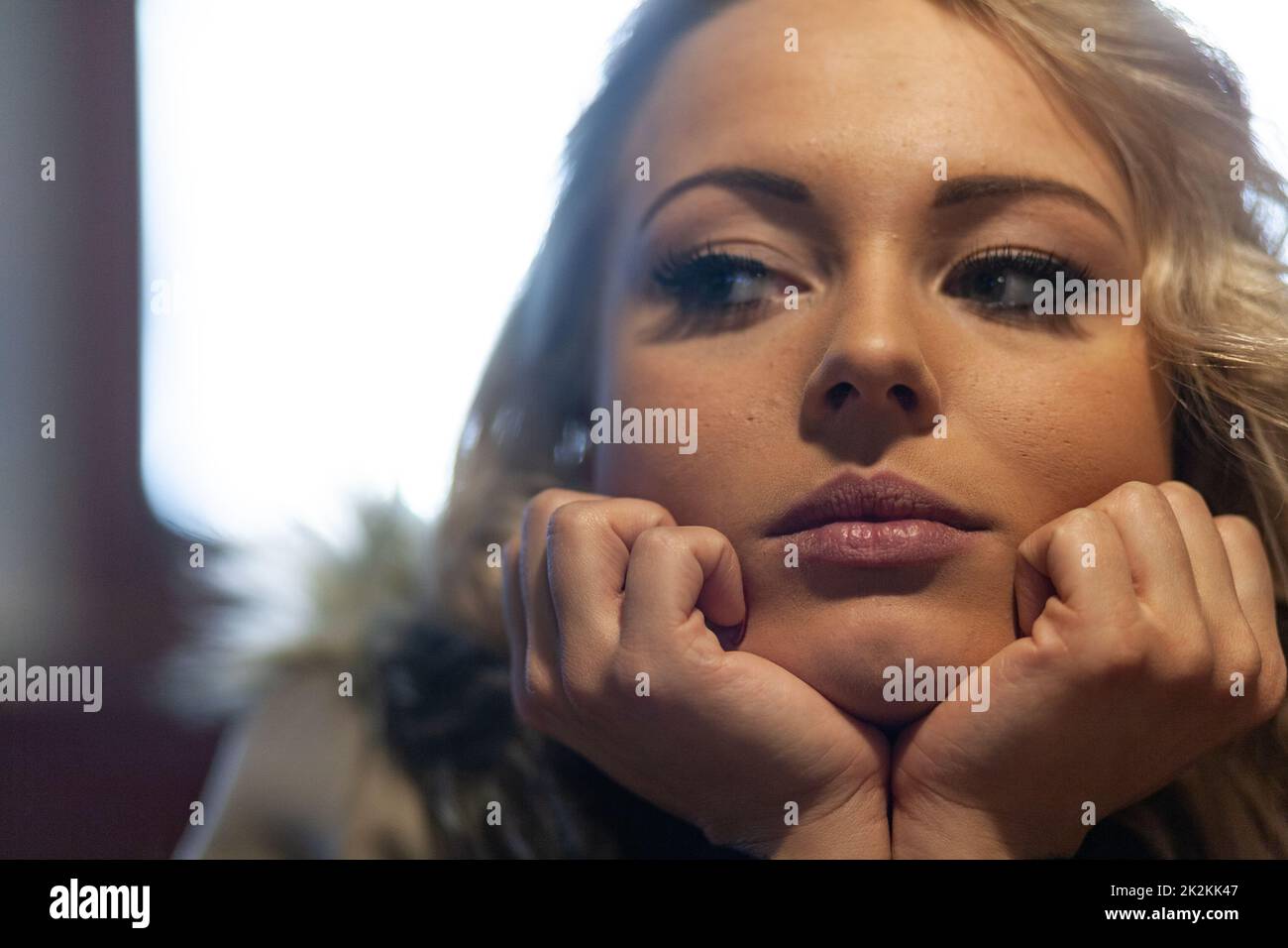 Close up cropped portrait of a pensive young woman Stock Photo - Alamy