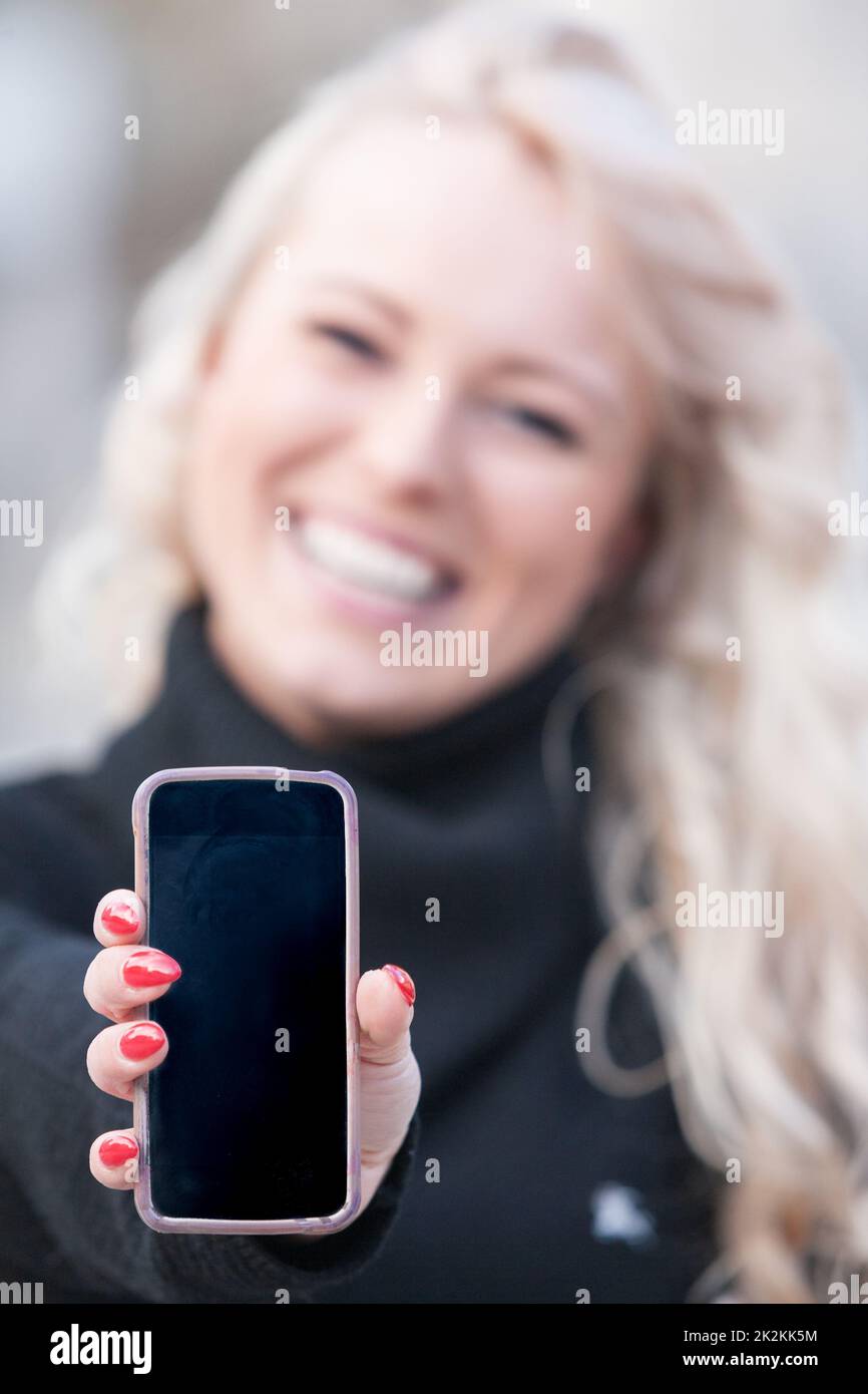 Showing mobile phone hi-res stock photography and images - Alamy