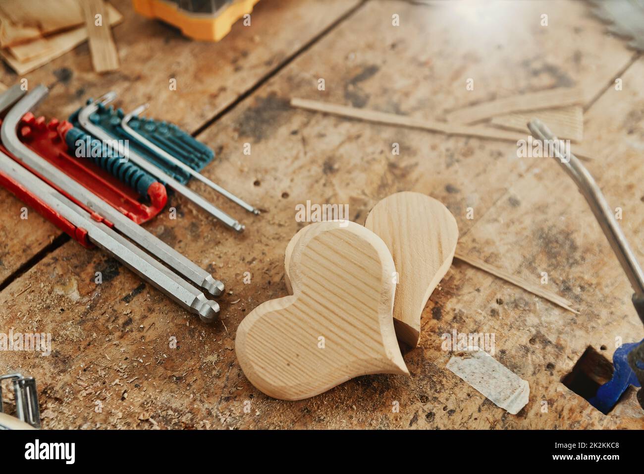 Two decorative wooden heart shapes on a carpentry workbench Stock Photo ...