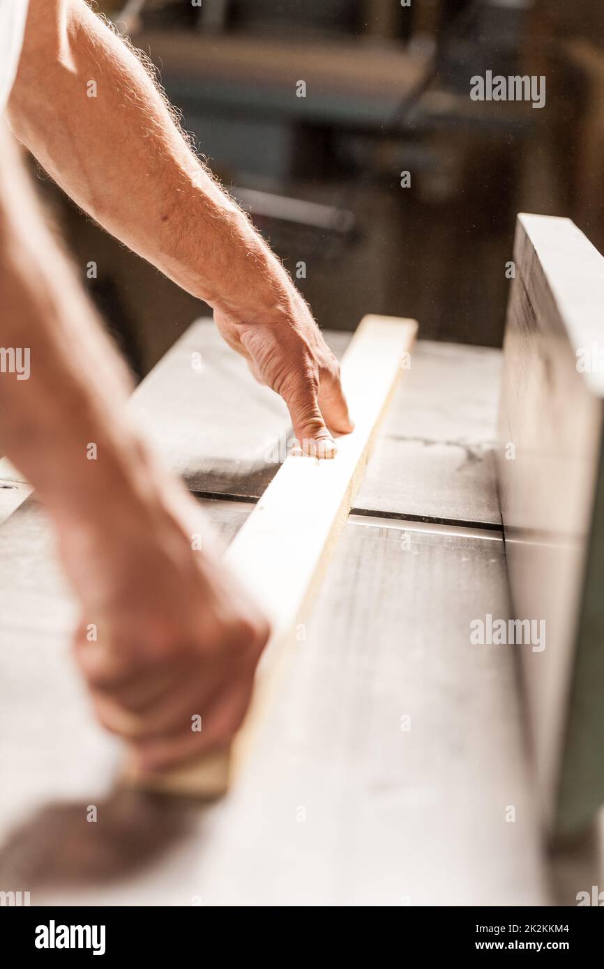 woodworker hands with wooden board Stock Photo - Alamy