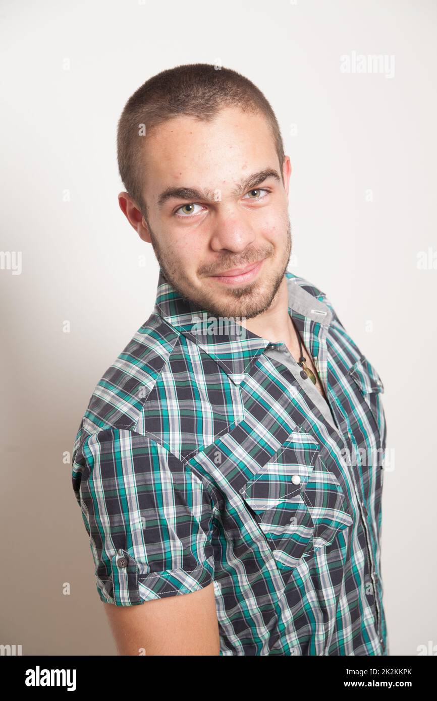 challenging cheering expression of a young guy Stock Photo - Alamy