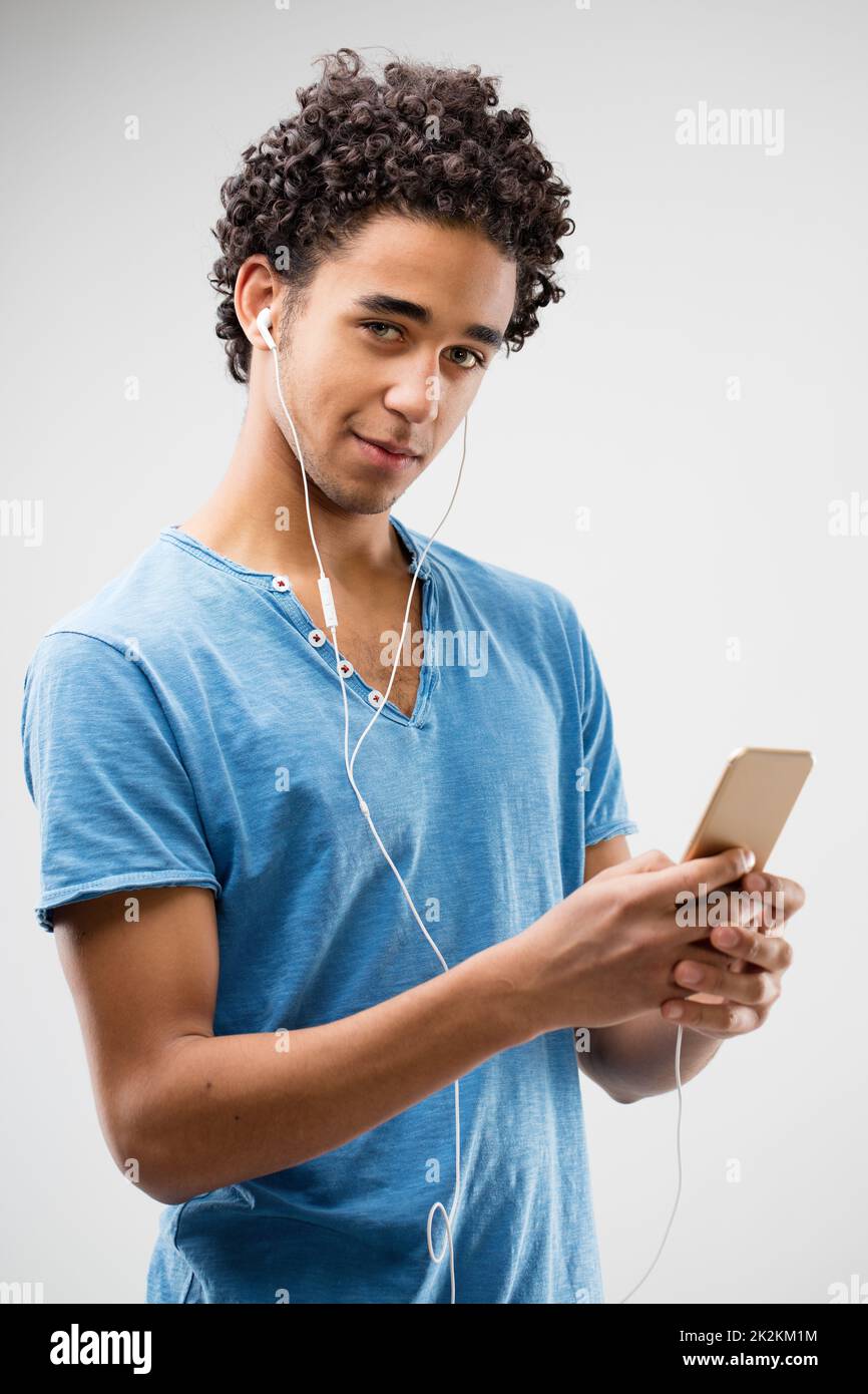 intelligent look of a young phone user Stock Photo - Alamy