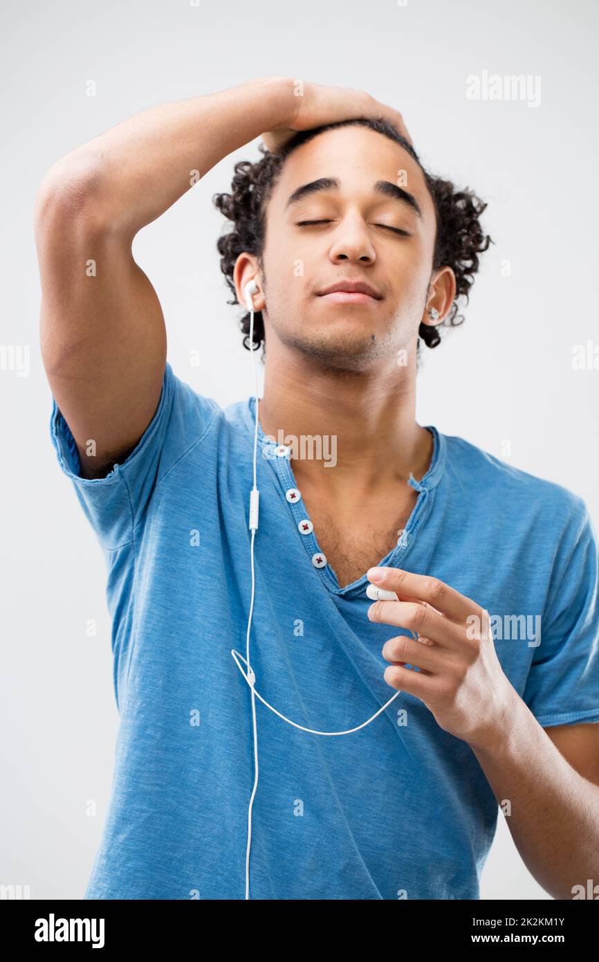 Listen to music eyes closed man hi-res stock photography and images - Alamy