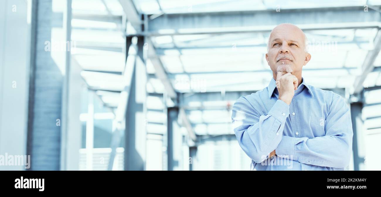 Mature man business arms hi-res stock photography and images - Alamy