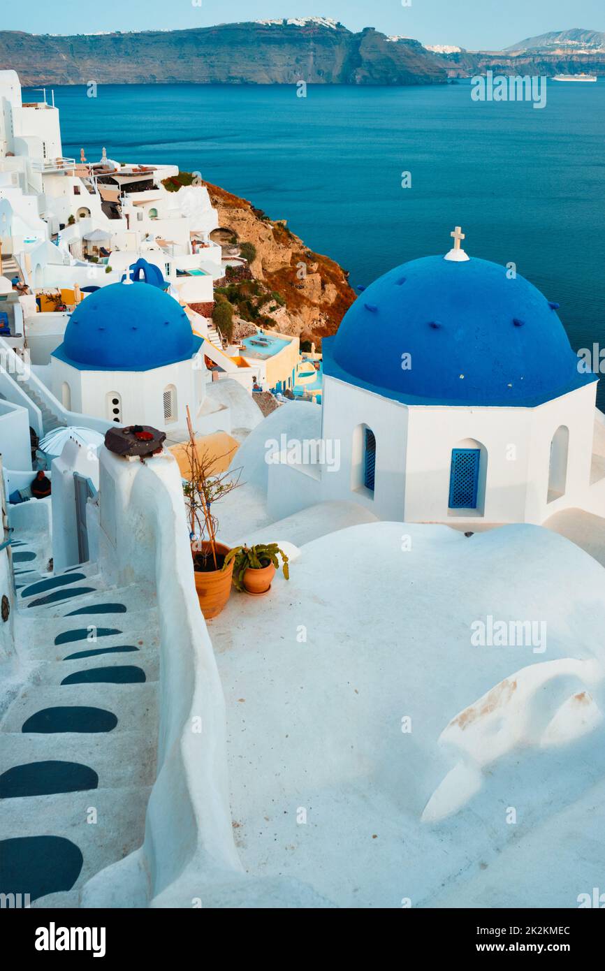 Famous view from viewpoint of Santorini Oia village with blue dome of ...