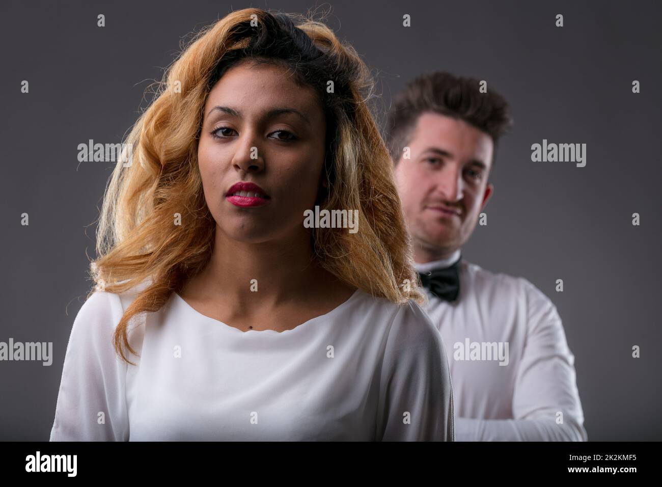 Woman controlling man relationship hi-res stock photography and images ...