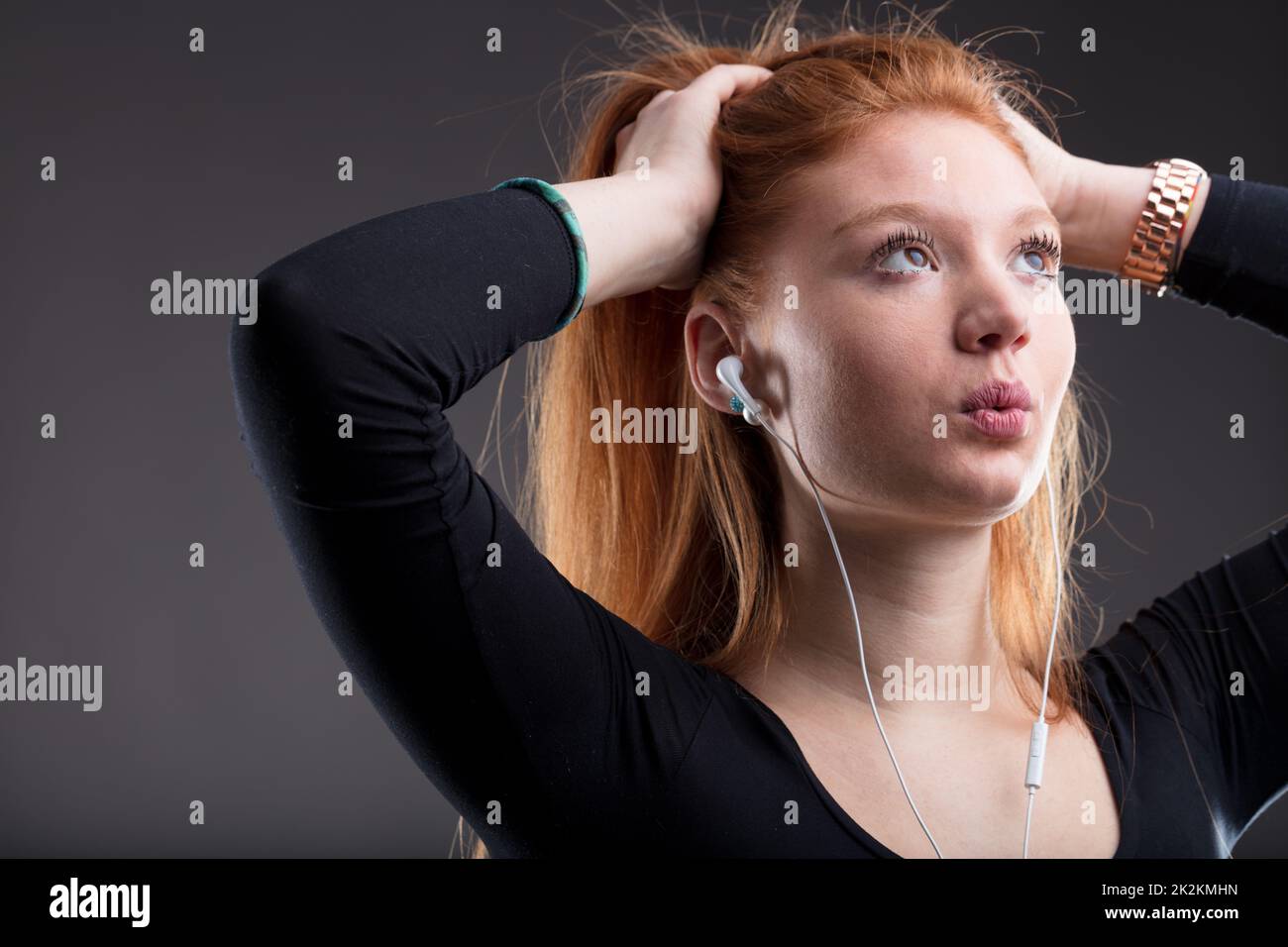 Woman listening earphones portrait hi-res stock photography and images ...