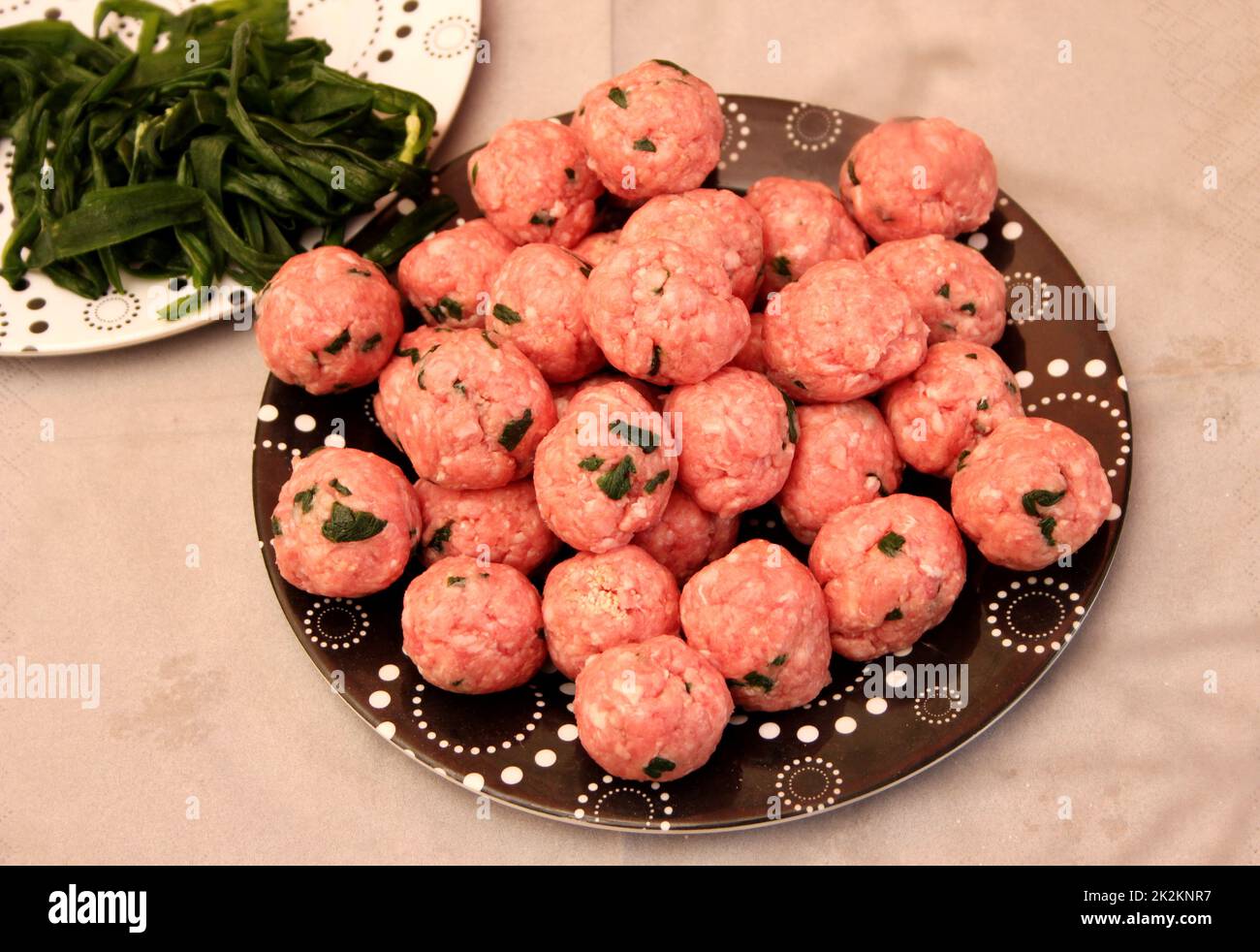 Raw meatballs hi-res stock photography and images - Alamy