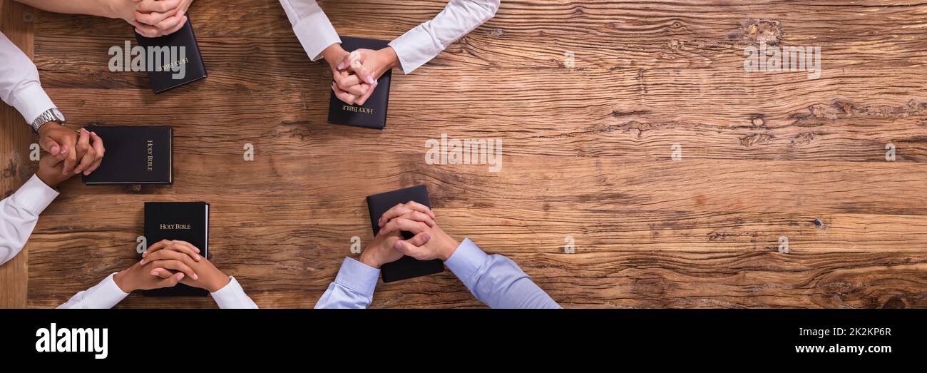 Person praying cross holy hi-res stock photography and images - Alamy
