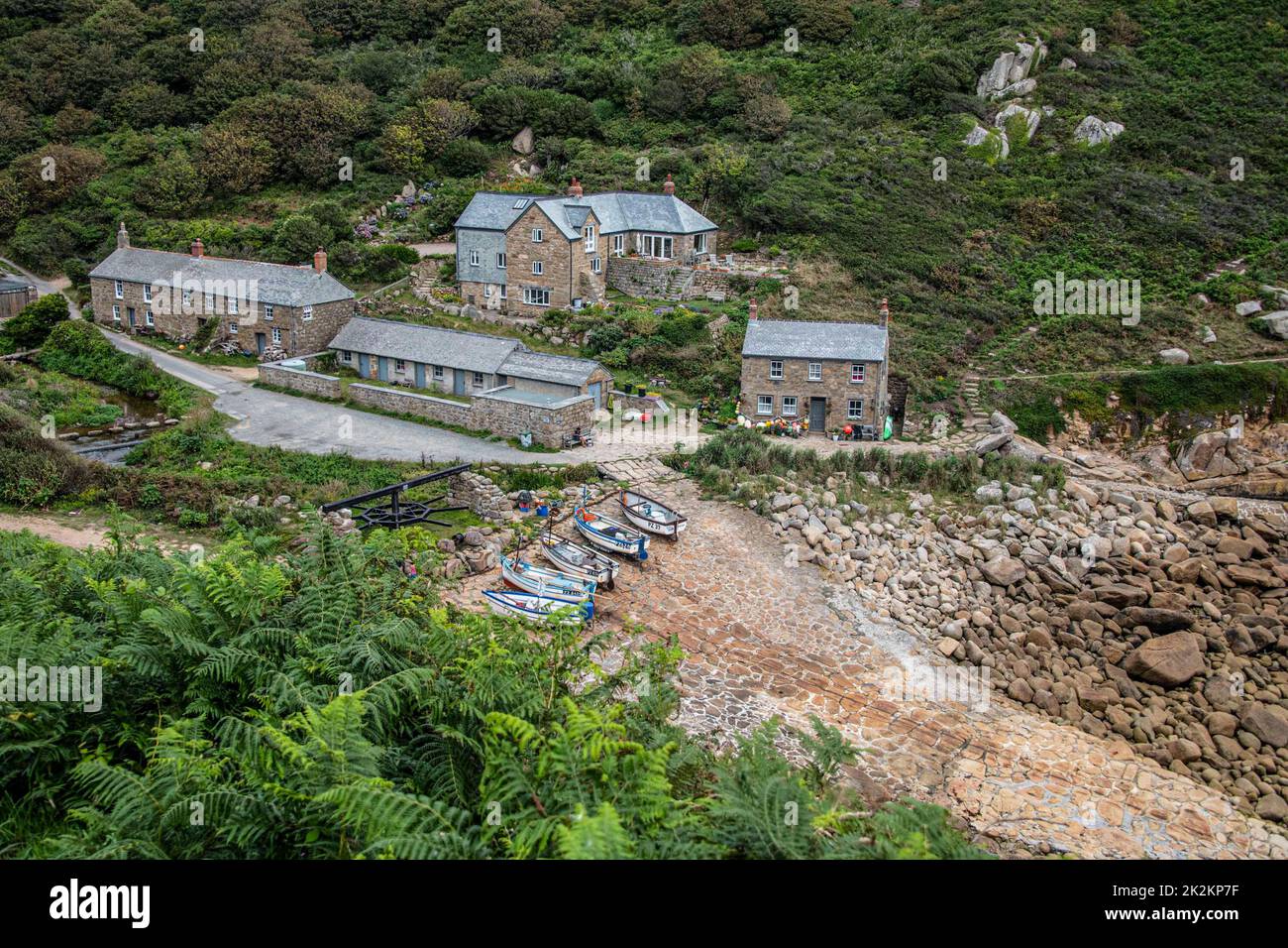 Cottage at Penberth Cove from the near by cliff,showing the stepping ...