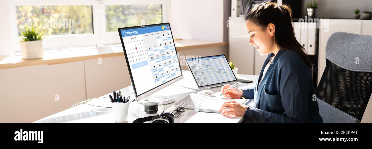 Looking At Calendar Schedule And Agenda Stock Photo - Alamy