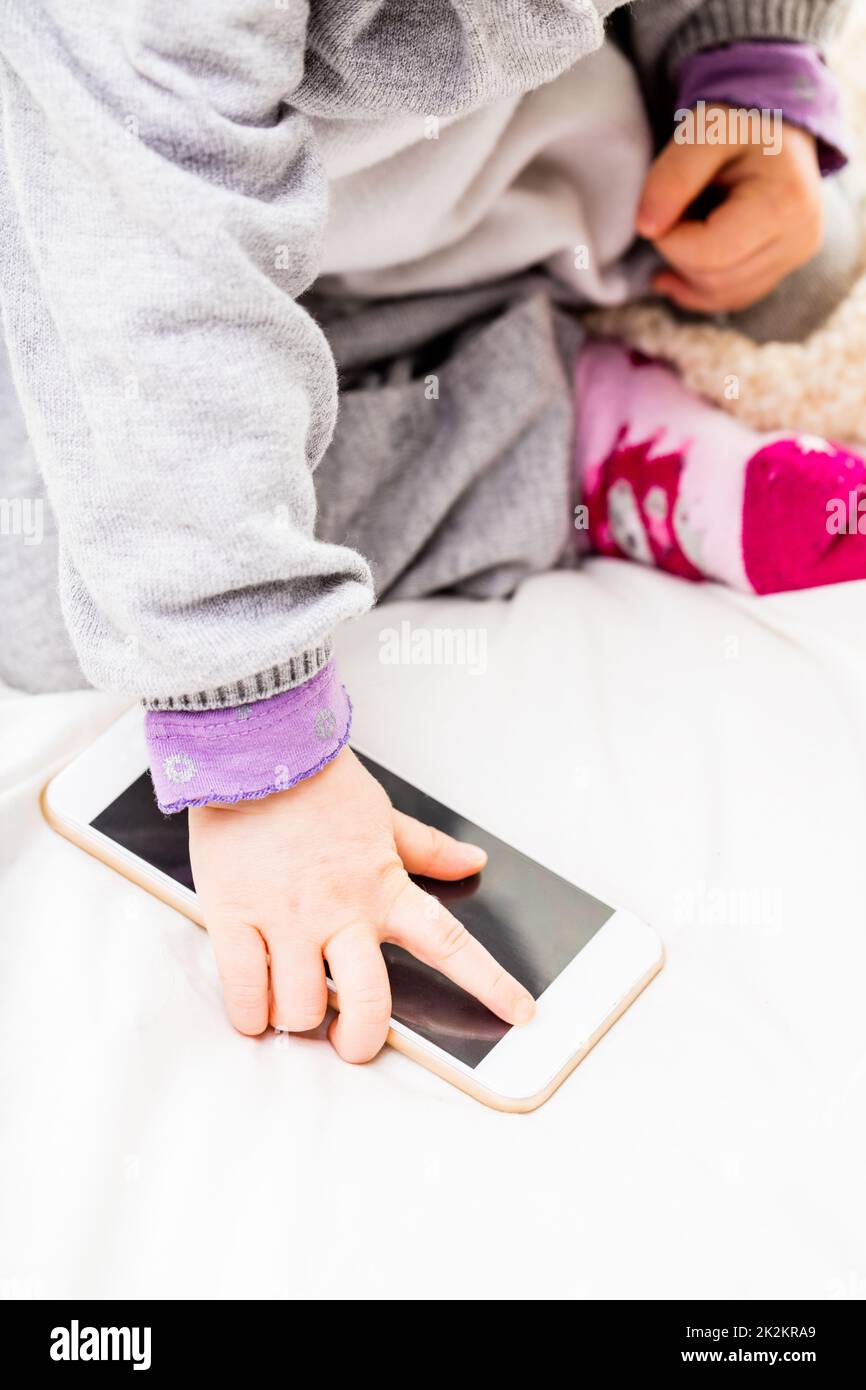 child trying a mobile phone Stock Photo - Alamy