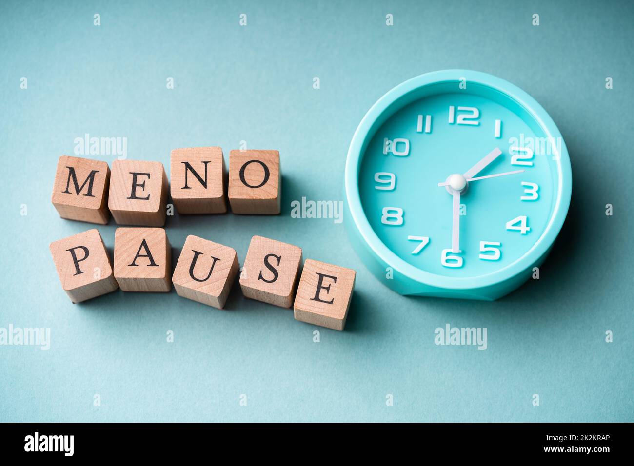 Menopause Time Clock Wooden Block Text Stock Photo - Alamy