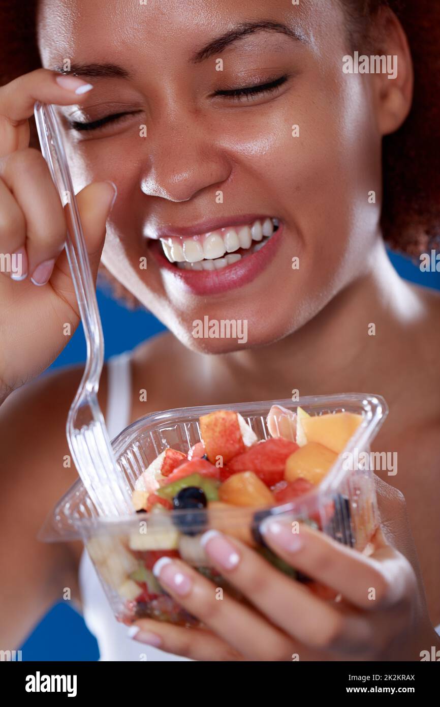 Candid portrait of a laughing healthy young Black woman Stock Photo - Alamy