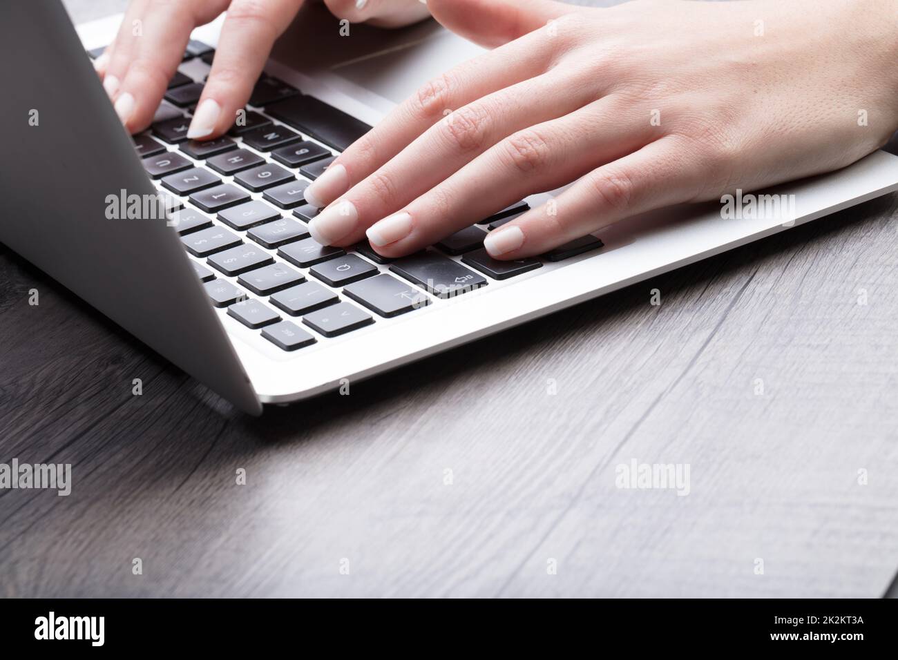 Woman working on laptop hands hi-res stock photography and images - Alamy