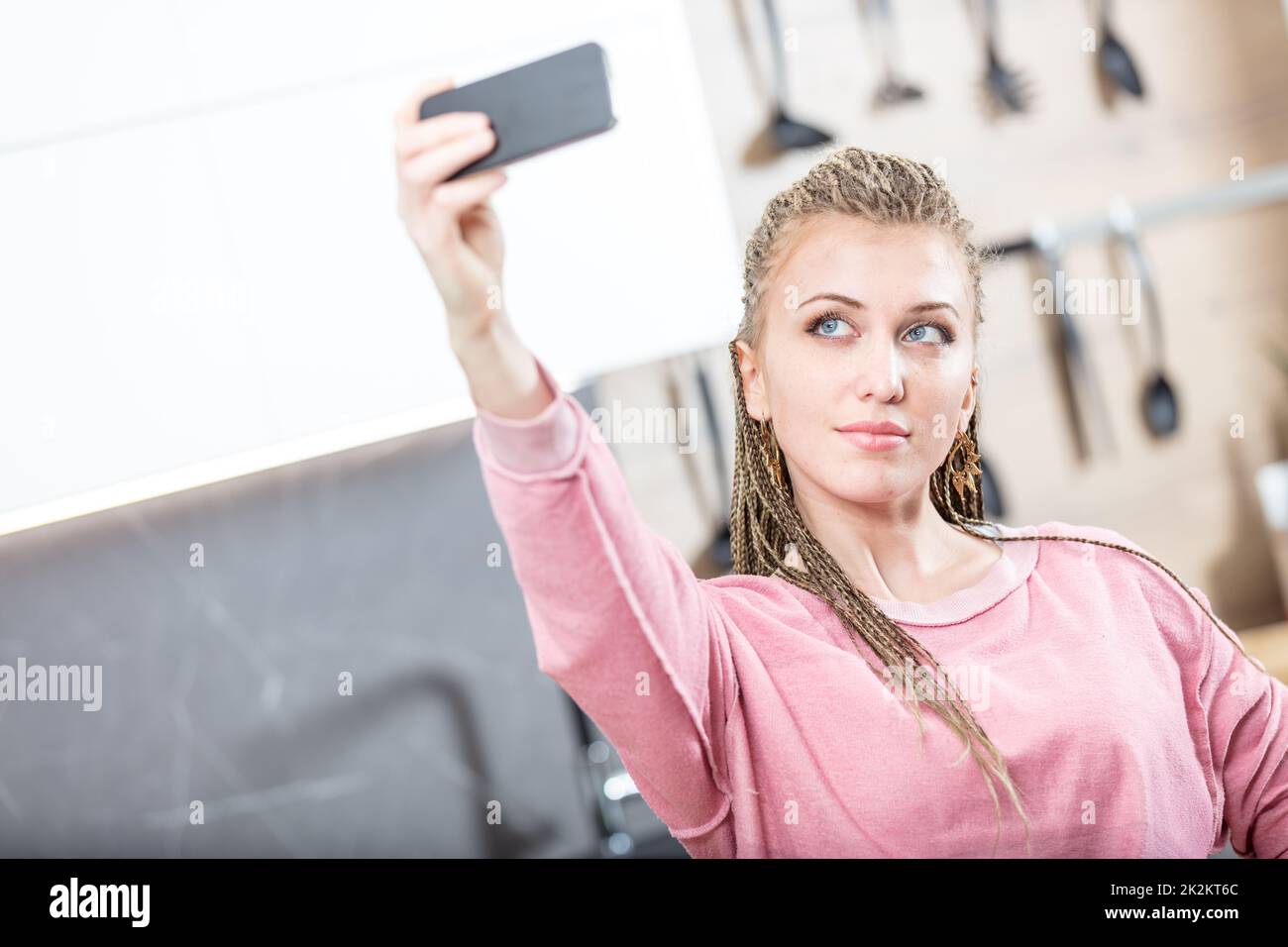 woman making a selfie in the kitchen Stock Photo - Alamy