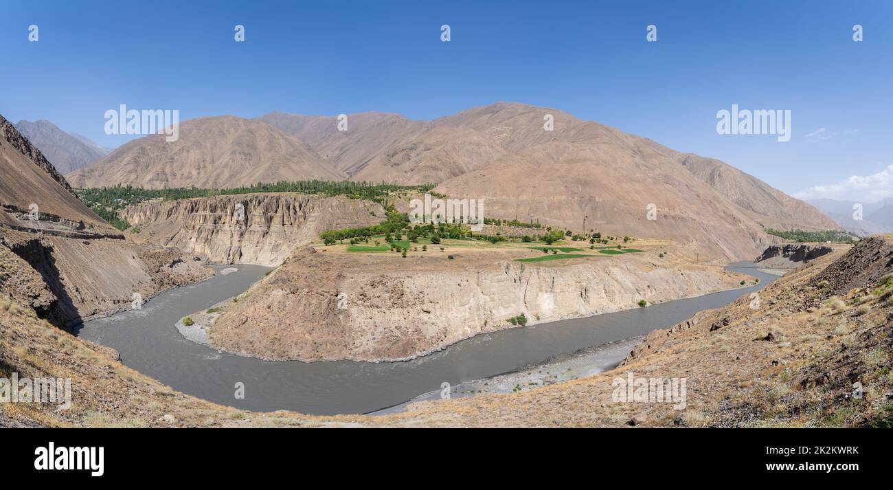 Scenic rural landscape panorama of meander Zeravshan river valley, Aini ...