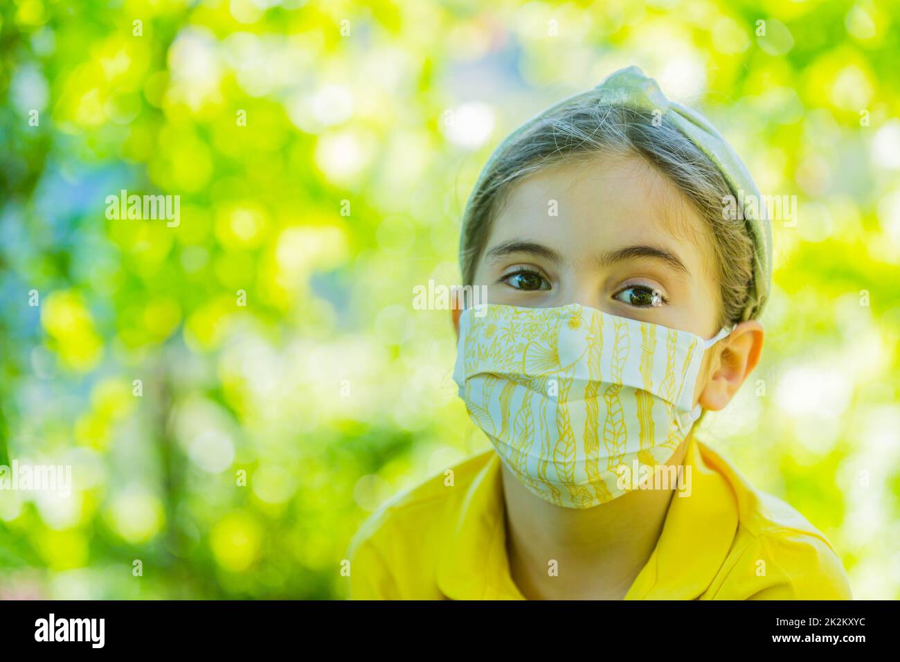 Little girl with mask Stock Photo - Alamy