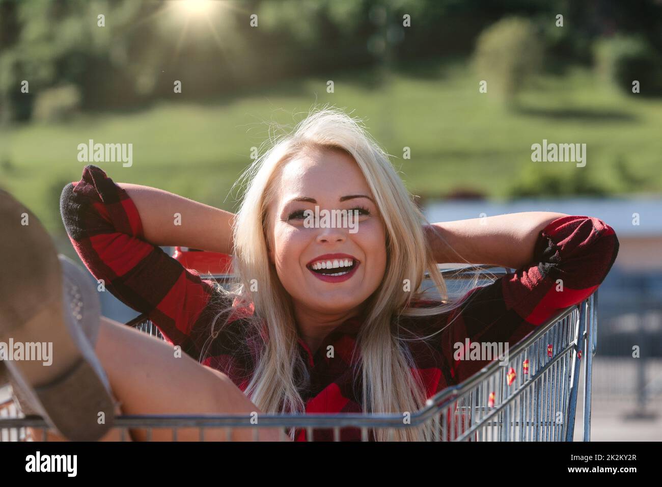 Cute blond woman posing hi-res stock photography and images - Alamy