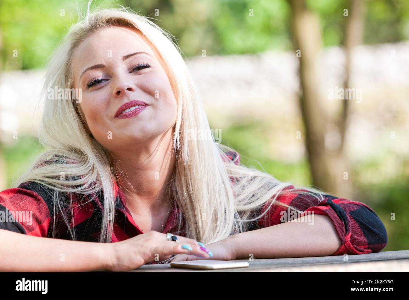 girl smiling about something funny Stock Photo - Alamy