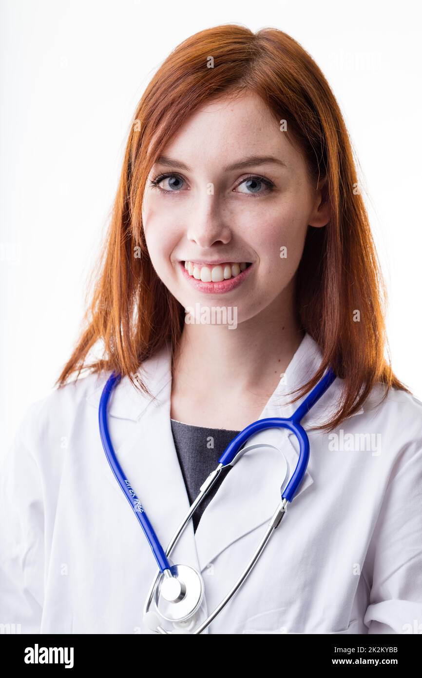 doctor woman smiling and has red hair Stock Photo - Alamy