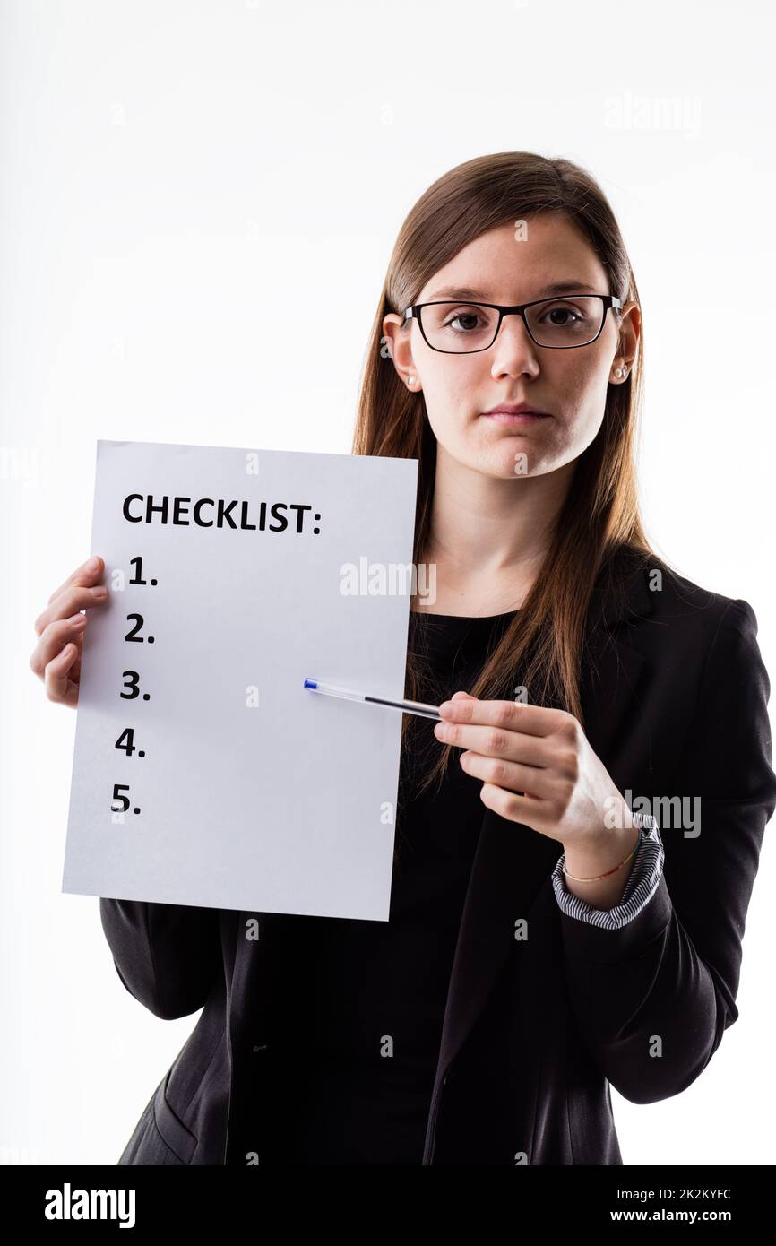 checklist held by a very organized woman Stock Photo - Alamy