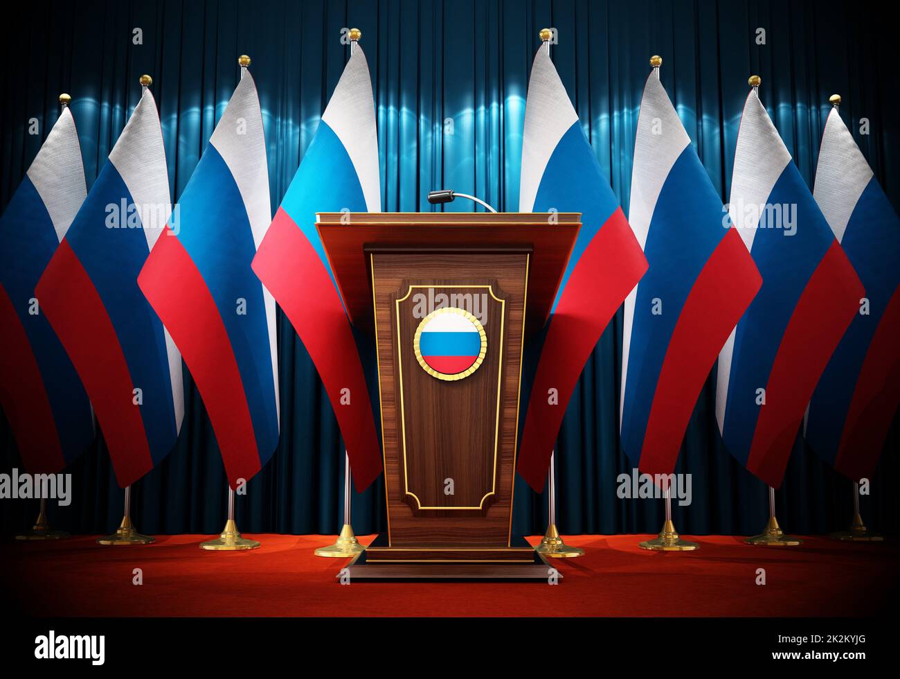 Group of Russian flags standing next to lectern in the conference hall ...