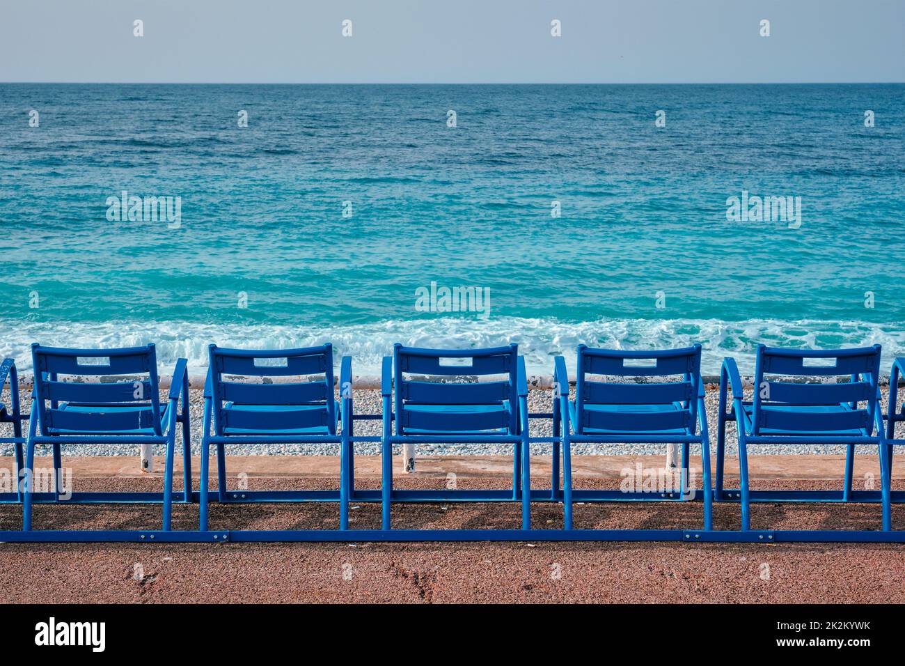 Famous blue chairs on beach of Nice, France Stock Photo - Alamy