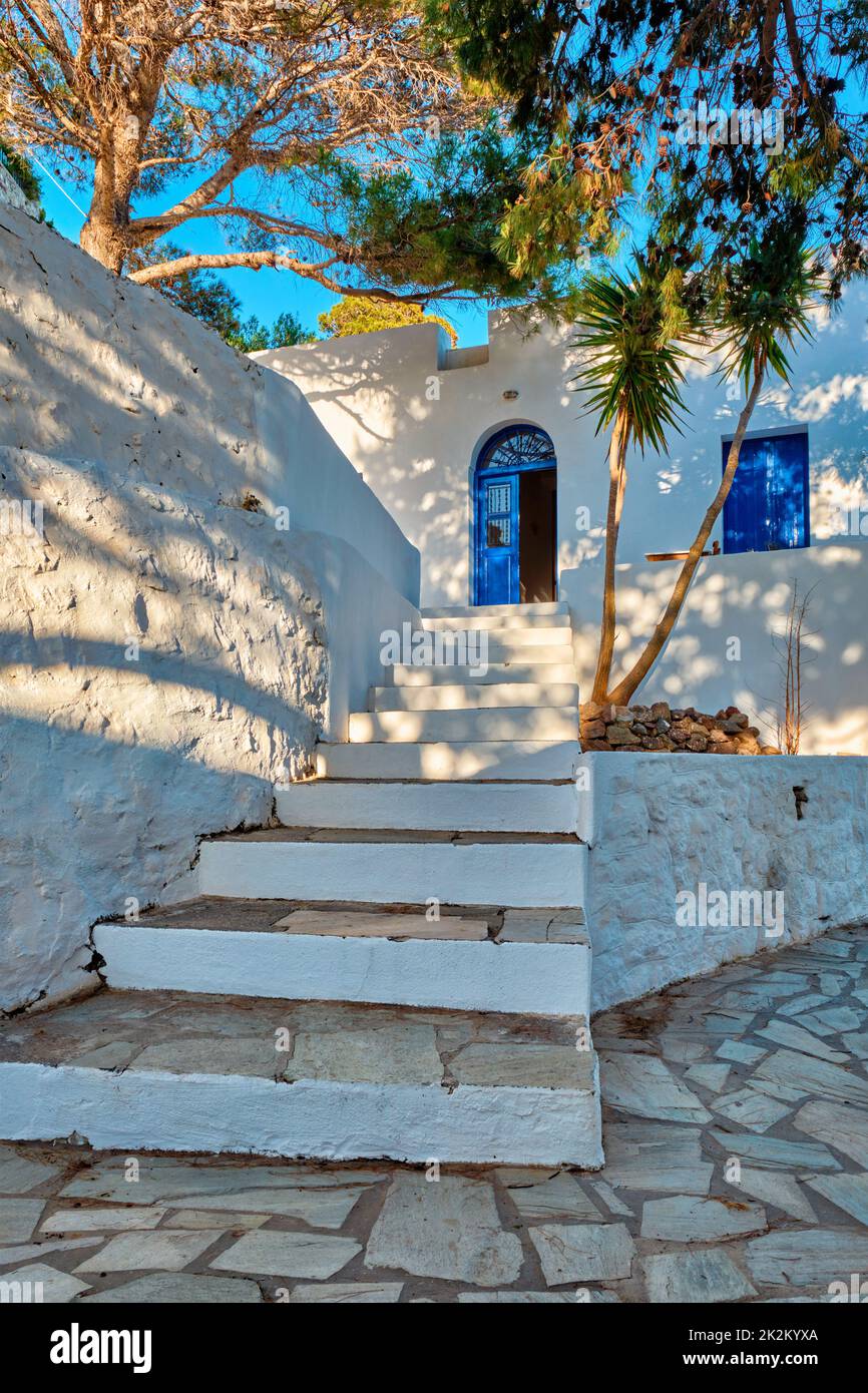 Greek village typical view with whitewashed houses and stairs. Plaka ...