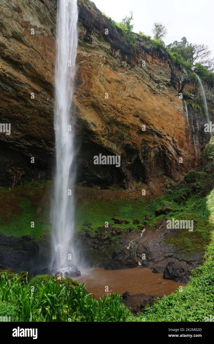 Very high waterfall, one of the Sipi Falls in Mount Elgon National Park ...