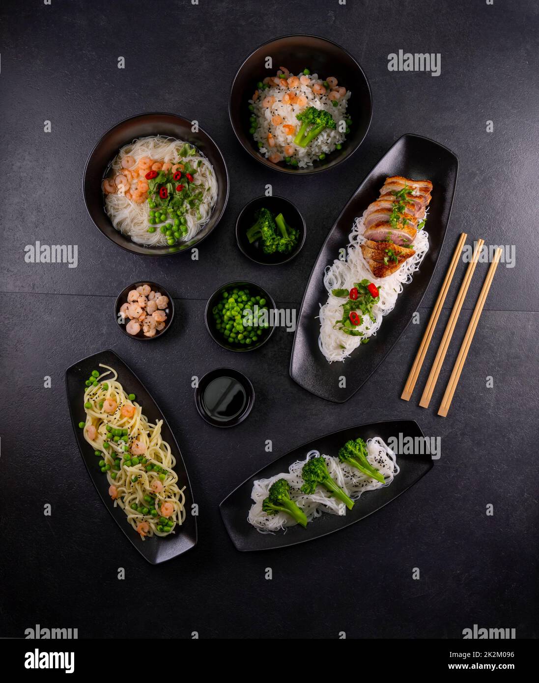 Various dishes of Asian cuisine with different types noodles and rice ...