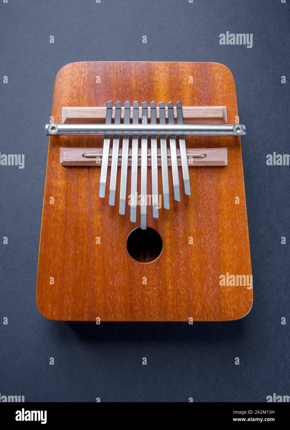 Traditional wooden kalimba isolated on black Stock Photo - Alamy