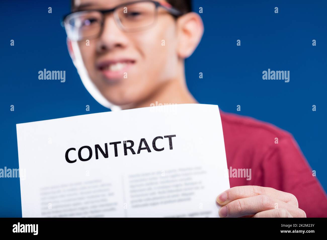 pride Chinese man holding a contract Stock Photo - Alamy