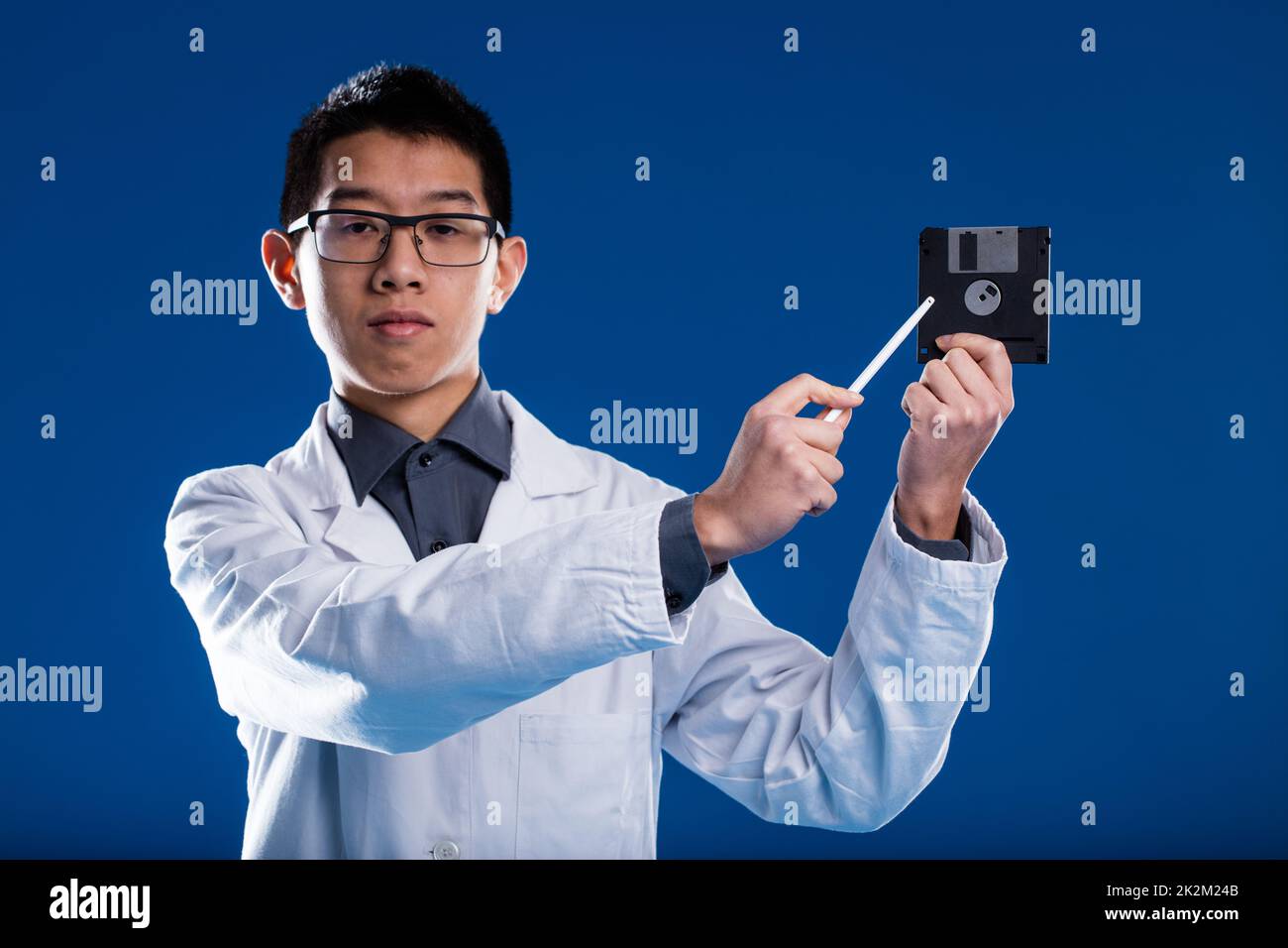 chinese scientist demonstrating ancient technology Stock Photo - Alamy