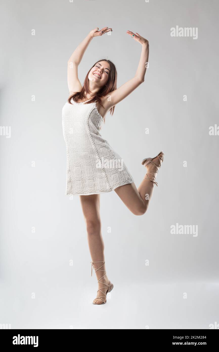 very happy woman dancing happily Stock Photo - Alamy