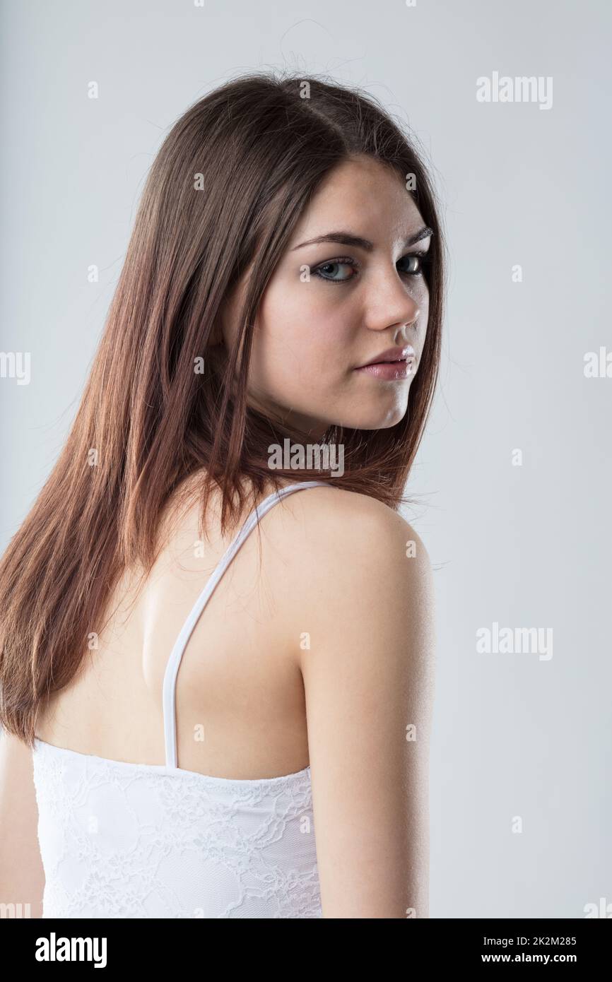 serious expression of a very young woman Stock Photo - Alamy