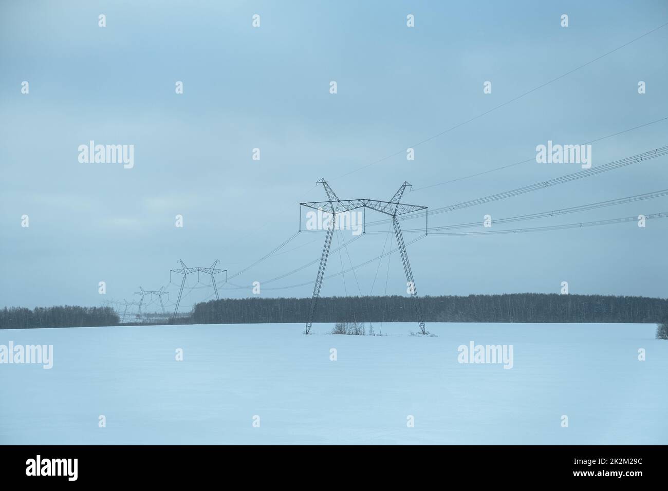 Electricity pylons covered in snow hi-res stock photography and images ...