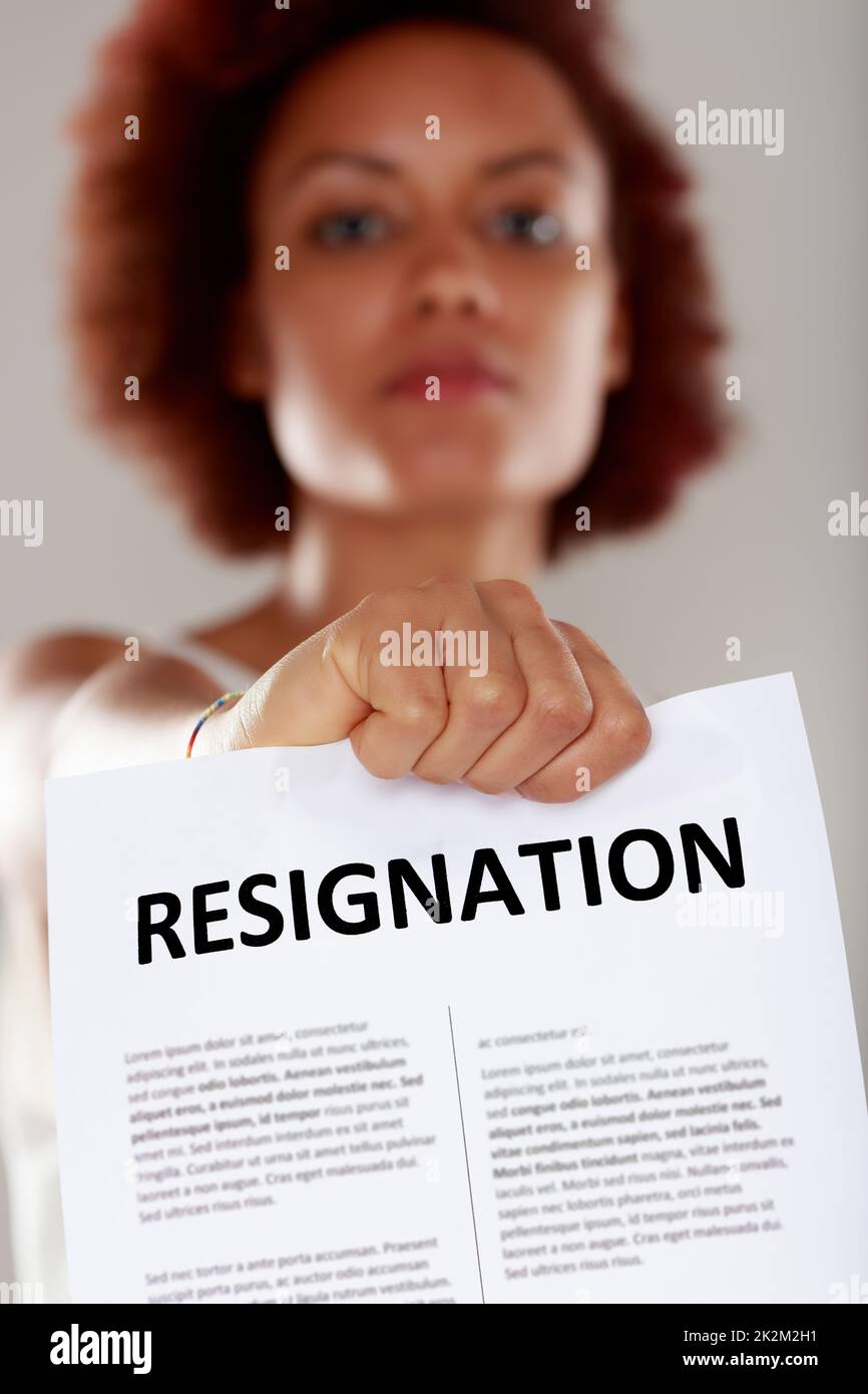 African American woman showing the resignation paper Stock Photo - Alamy