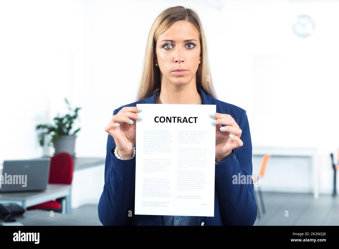 woman holding and showing a contract Stock Photo - Alamy