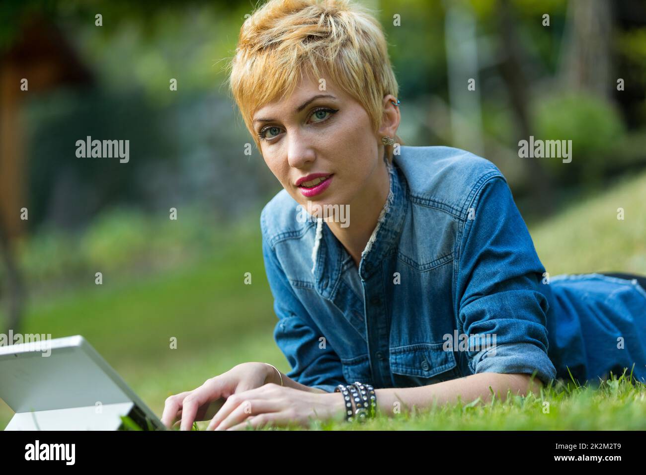 time off surfing on the grass Stock Photo - Alamy