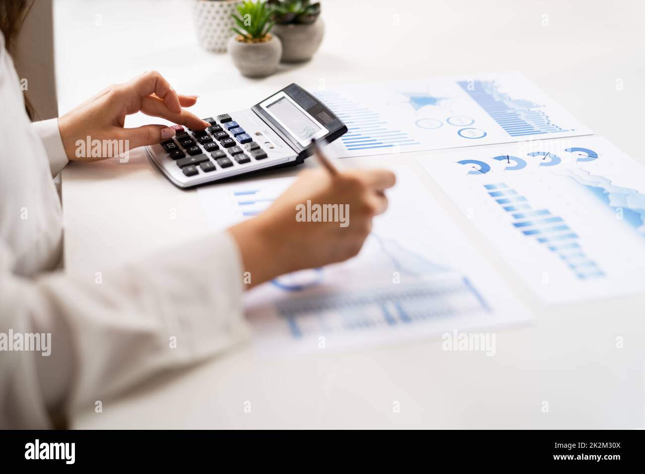 Business Accountant Using Finance Chart Document Stock Photo - Alamy