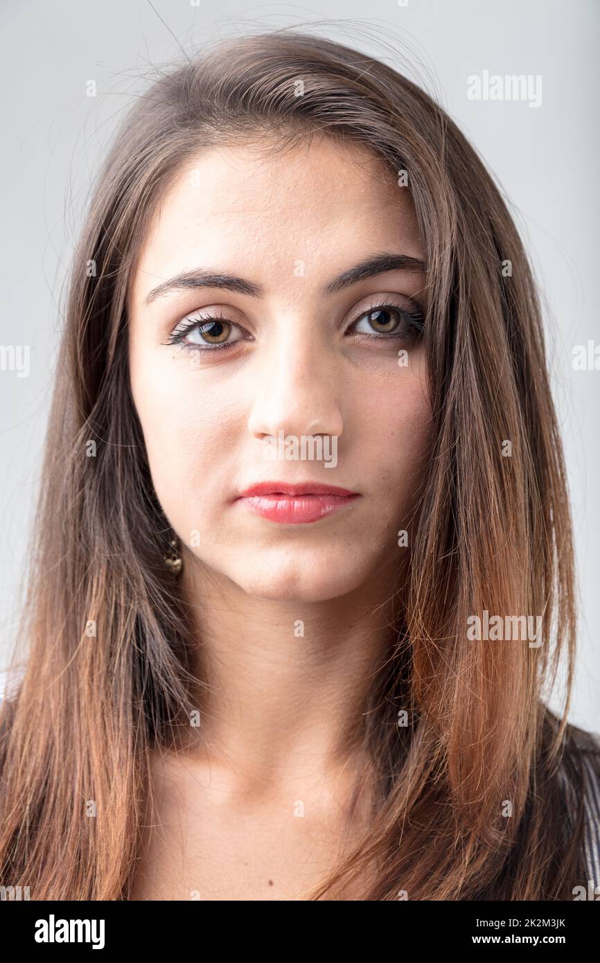 Attractive thoughtful young brunette woman Stock Photo - Alamy Attractive thoughtful young brunette woman Stock Photo - Alamy