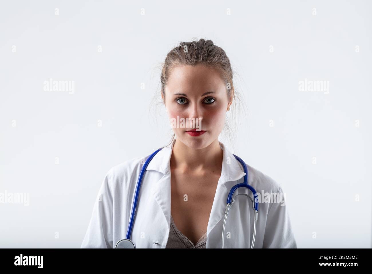 serious, professional female doctor in a front portrait Stock Photo - Alamy