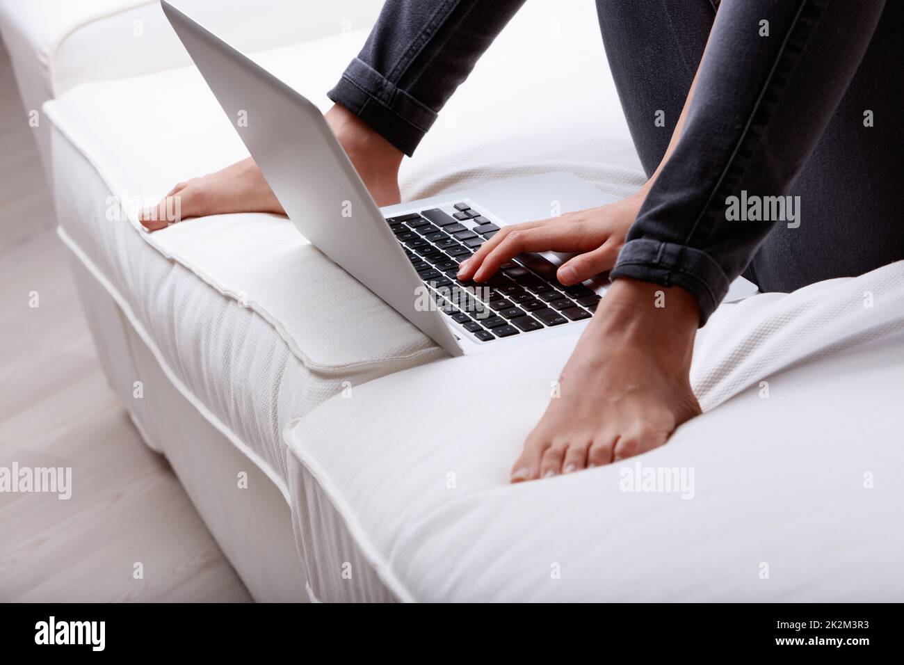 Barefoot woman jeans hi-res stock photography and images - Alamy