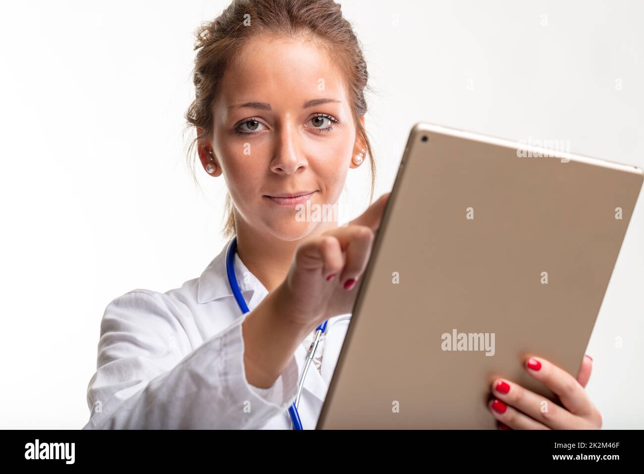 Doctor nurse using tablet computer hi-res stock photography and images - Alamy
