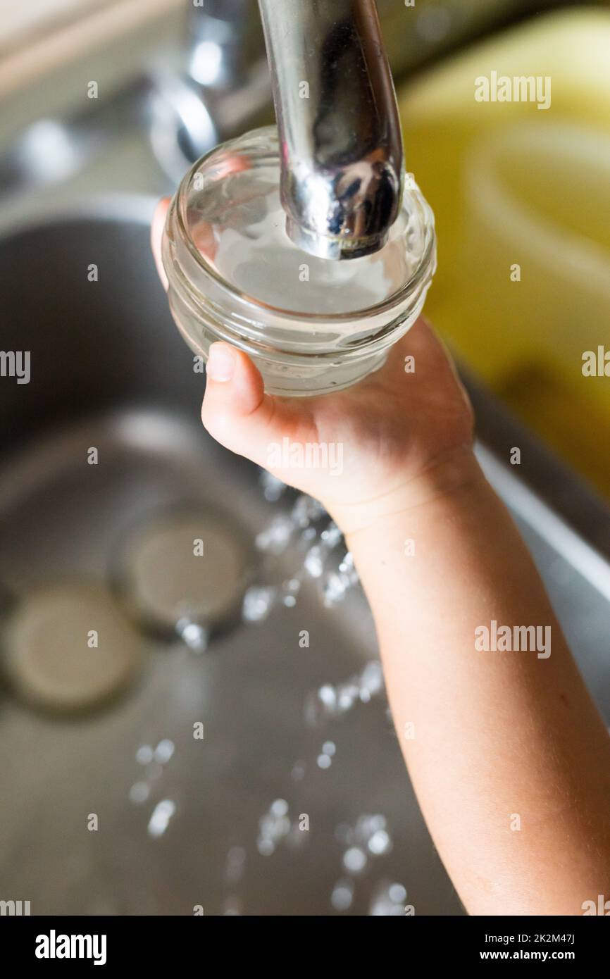 Child arm cold water hi-res stock photography and images - Alamy