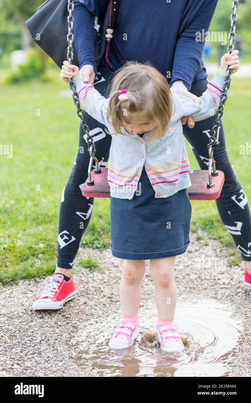 Girl with swing hi-res stock photography and images - Alamy